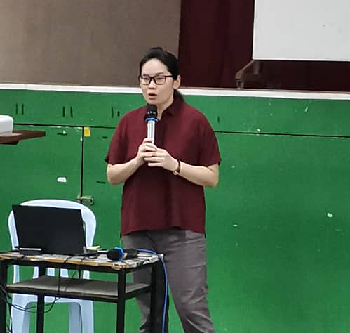 Ms Phang explaining the common types of scams